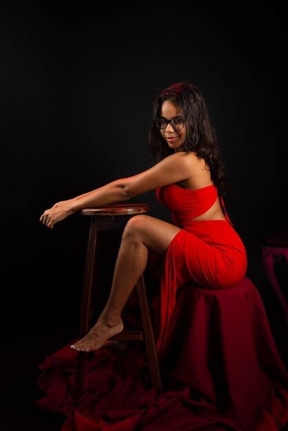 Premium Photo Portrait Of Beautiful Young Woman Wearing Glasses And