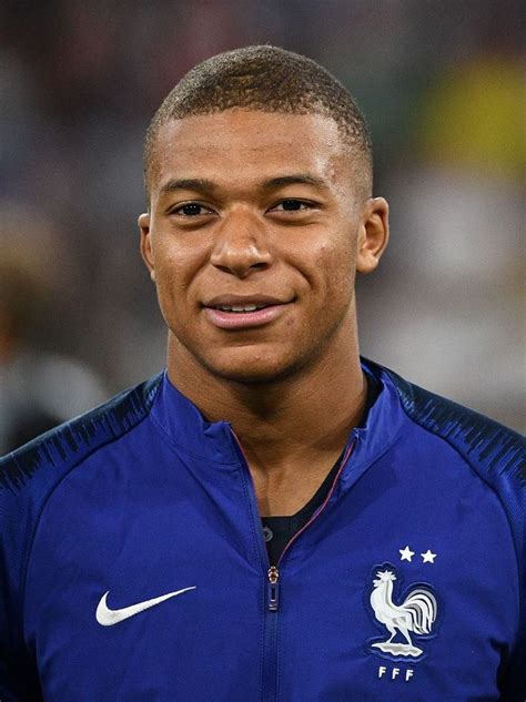 France S Forward Kylian Mbappe Listens To His National Anthem Ahead