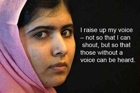 A Woman With A Pink Shawl On Her Head And An American Great Quote In