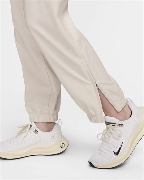 Nike Dri FIT Seasonal Novelty Women S Dri FIT Mid Rise Running Trousers Nike IN