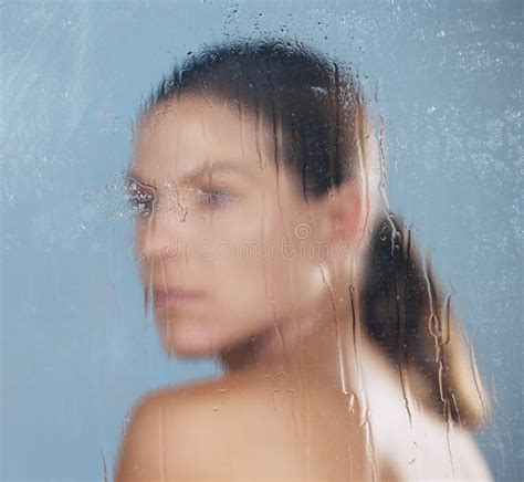 Its Hot And Steamy In Here A Woman Standing Behind A Steamy Glass Door