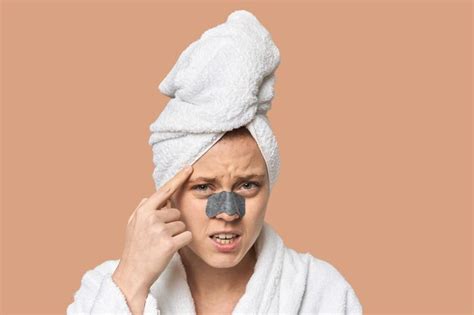 Premium Photo Young Caucasian Redhead With Pore Strip Showing A