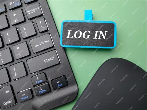 Premium Photo Wireless Keyboard And Mouse With The Word Log In On Green Background Premium Photo Wireless Keyboard And Mouse With The Word Log In On Green Background