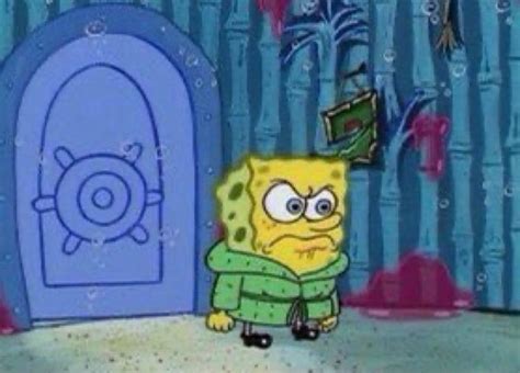 Spongebob Is Standing In Front Of An Open Door
