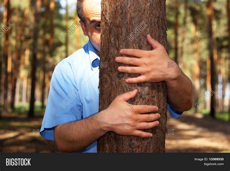 Man Hiding Behind Tree Image Photo Free Trial Bigstock
