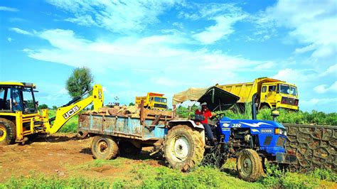Jcb 3dx Backhoe Machine Loading Mud In Eicher 380 Tractor Road Working