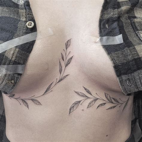 Tattoo In Between Breast Stunning Placement And Design Guide