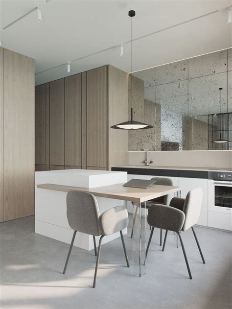 a kitchen with a table, chairs and oven in the middle of it on concrete ...
