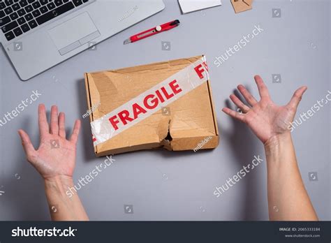 Broken Fragile Parcel Torn Cardboard Box Stock Photo 2065333184 Shutterstock