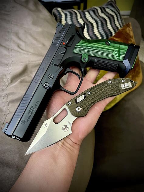 for those that want a more grippy button the microtech button works in the axial shift with