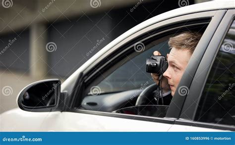 Reporter Secretly Taking Photo Sitting In Auto Spying Paparazzi