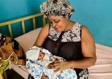 A Nigerian Woman Expresses Joy As Her Sister Welcomes A Newborn At The