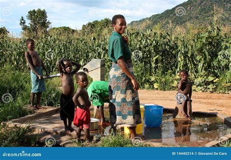 Mother And Sons By A Fountain In Africa Editorial Stock Image Image