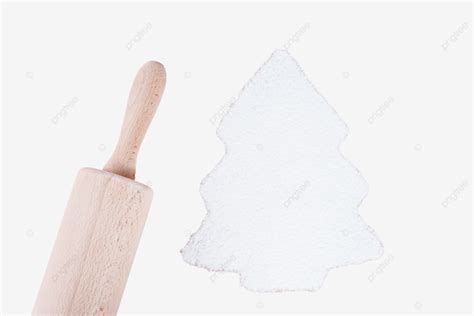 A Christmas Treeshaped Flour Mound Rolled With A Rolling Pin Mix Roll