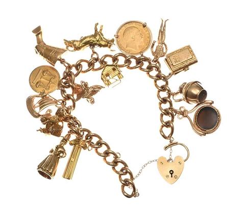 Heavy 9ct Gold Charm Bracelet
