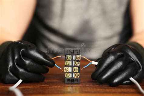 Electrician Hands Connecting Wires In Terminal Block Connection Of Wires With Clamps Stock