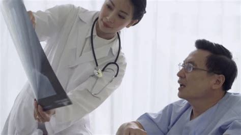 Doctor Take Care Of Patient At Hospital Or Medical Clinic Stock Footage