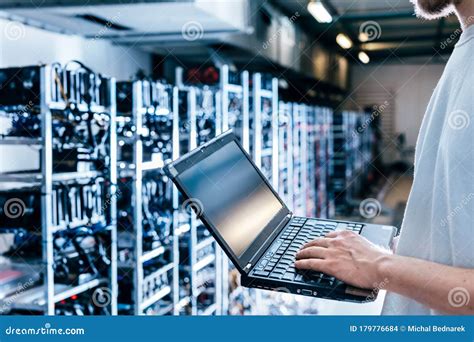 It Specialist Working On Computer In Bitcoin And Crypto Currency Mining
