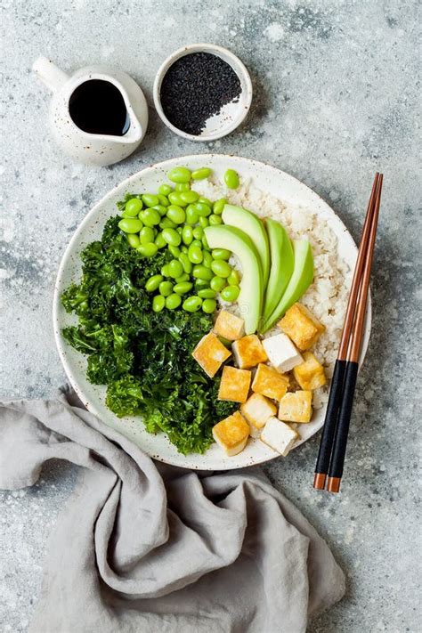 Cauliflower Rice Buddha Bowl With Massaged Kale Tofu Avocado And