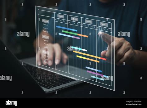 Project Manager Analyst Working With Computer In Management System To Progress Planning And Make