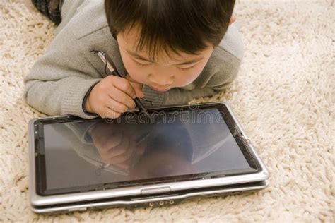 Boy And Notebook Stock Image Image Of Asian Playing 13091873