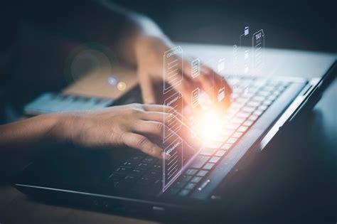 Premium Photo Hand Using Laptop And Touch Folder Of Document