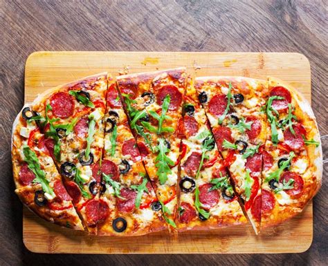 Oval Pizza With Mozzarella Cheese Tomatoes Pepper Spices And Fresh