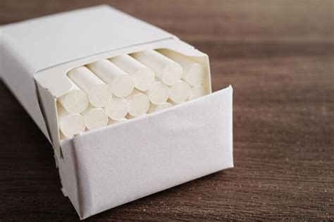 Premium Photo Cigarette In Pack Roll Tobacco In Paper With Filter