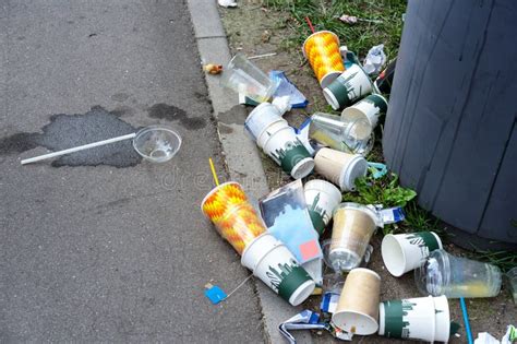 Full Garbage Bin On A Street In The City Concept Of Garbage Pollution In Large Cities Stock