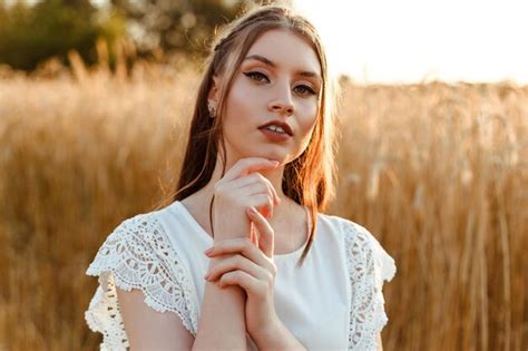 Premium Photo Tranquil Beautiful Woman In White Dress With Long Hair