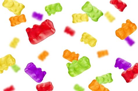Falling Colorful Jelly Gummy Bear Isolated On White Background Selective Focus Gomitas