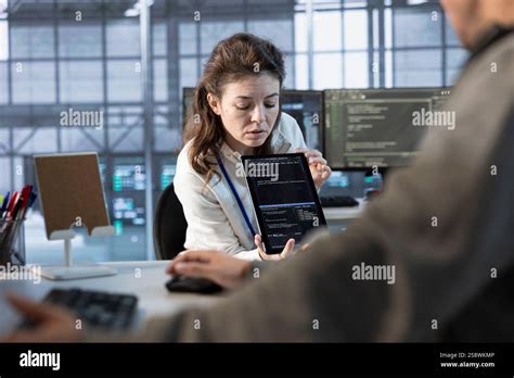 admin in server hub using tablet implementing power management solutions to reduce energy