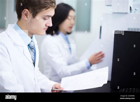 People Analysis Experimental Data In Computer In Lab Stock Photo Alamy