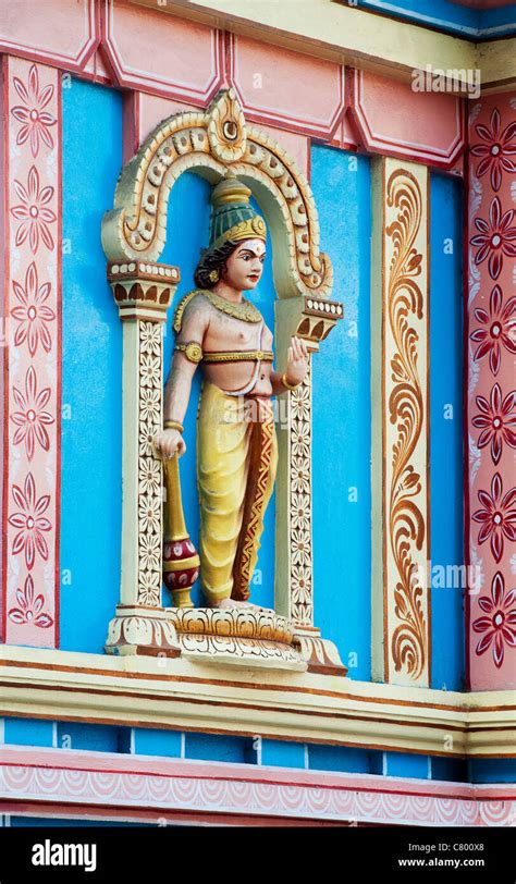 Hindu Deity Statue On The Front Of The Indian Gopuram Temple Gate At