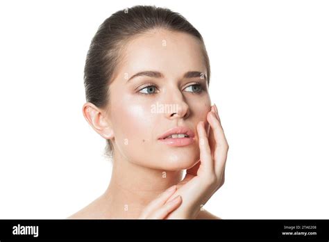 Attractive Woman Touching Her Flawless Glowy Fresh Clean Facial Skin