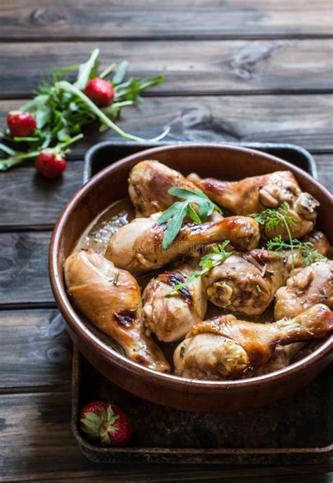 Grilled Chicken Leg With Salad From A Mix Of Leaf Lettuce Arugula And