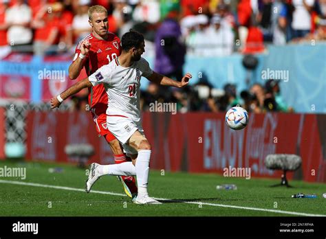 Doha Qatar November 25 Aaron Ramsey Ahmad Noorollahi During The