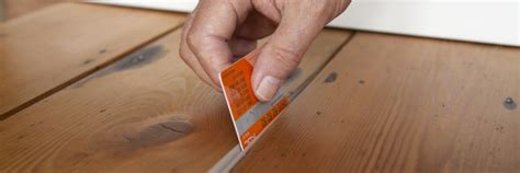 Filling Gaps In Floorboards With StopGap
