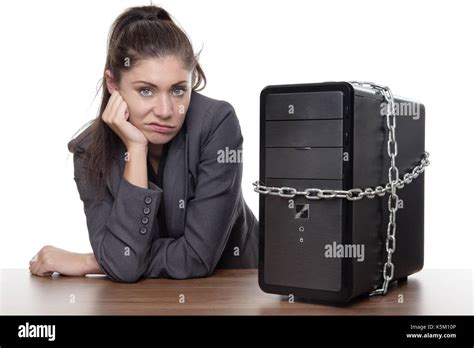 Computer Locked Up And Business Woman Not Looking Very Happy Unsure What To Do Stock Photo Alamy