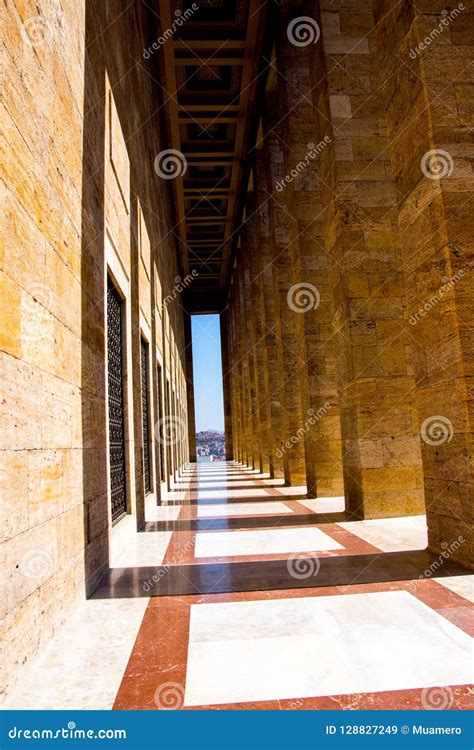 The Narrow Passage With The Pattern Columns Making Shadows Around The