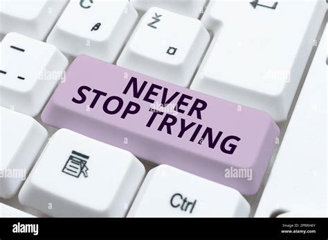 sign displaying never stop tryingdo not give up continue to try again