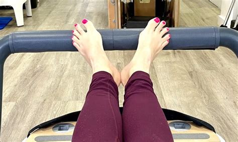 Pilates Footwork Exercise Using The Reformer Machine Positions