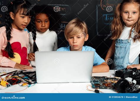 Student Learn About Coding Robotics Car In Stem Class With Attention