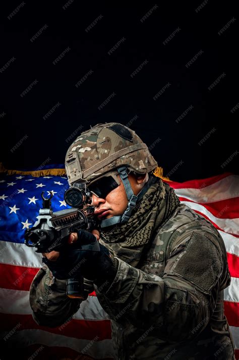 Premium Photo Photo Of Soldier Holding The Usa Flag In Background