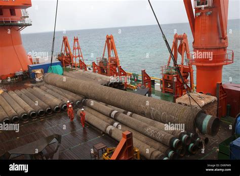 140330 Dar Es Salam March 30 2014 Xinhua Worker Works On Chinas Cpp 601 Pipelaying