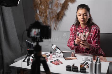 Beauty Blogger Or Vlogger Filming Daily Make Up Routine Tutorial On Camera Showing Make Up