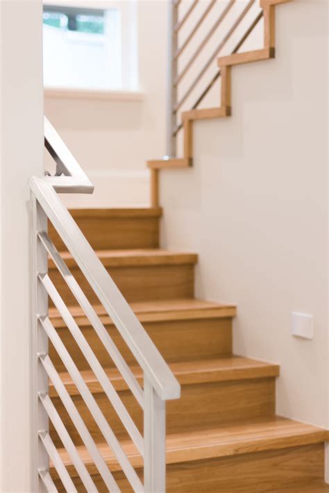 Contemporary Style Wooden Staircase With Metal Railing Custom Home