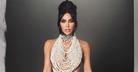 Kim Kardashian Slips Into A Red Hot Monokini Skimpy Animal Print