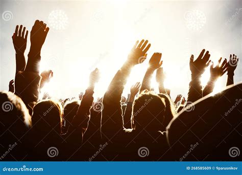 Cheering People Crowd On The Dance Floor During A Music Concert Stock