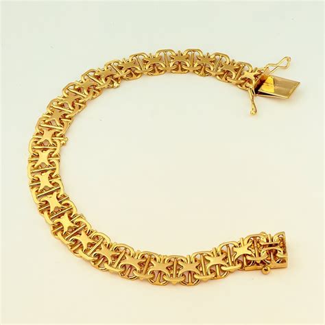 X Länk Armband 18k Guld 19cm 24 5gram Smyckesbanken